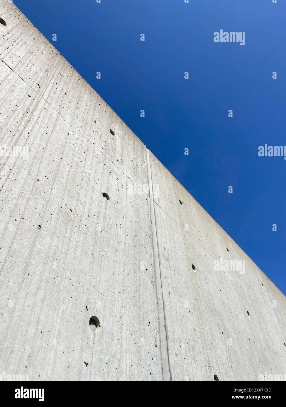 Tadao Ando's famous concrete wall against clear blue sky Stock Photo ...