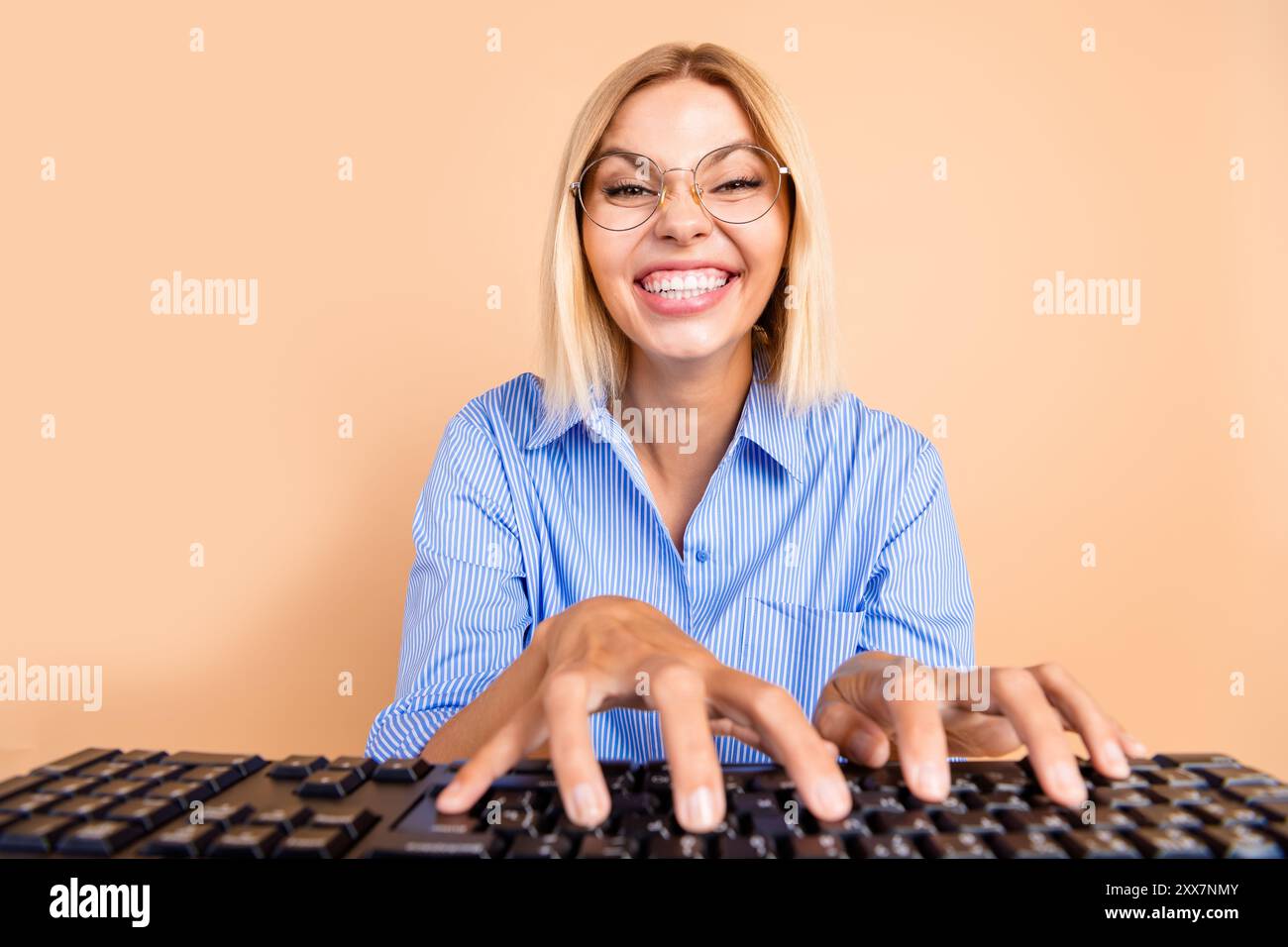 Photo of funny funky girl wear blue shirt typing modern device empty ...