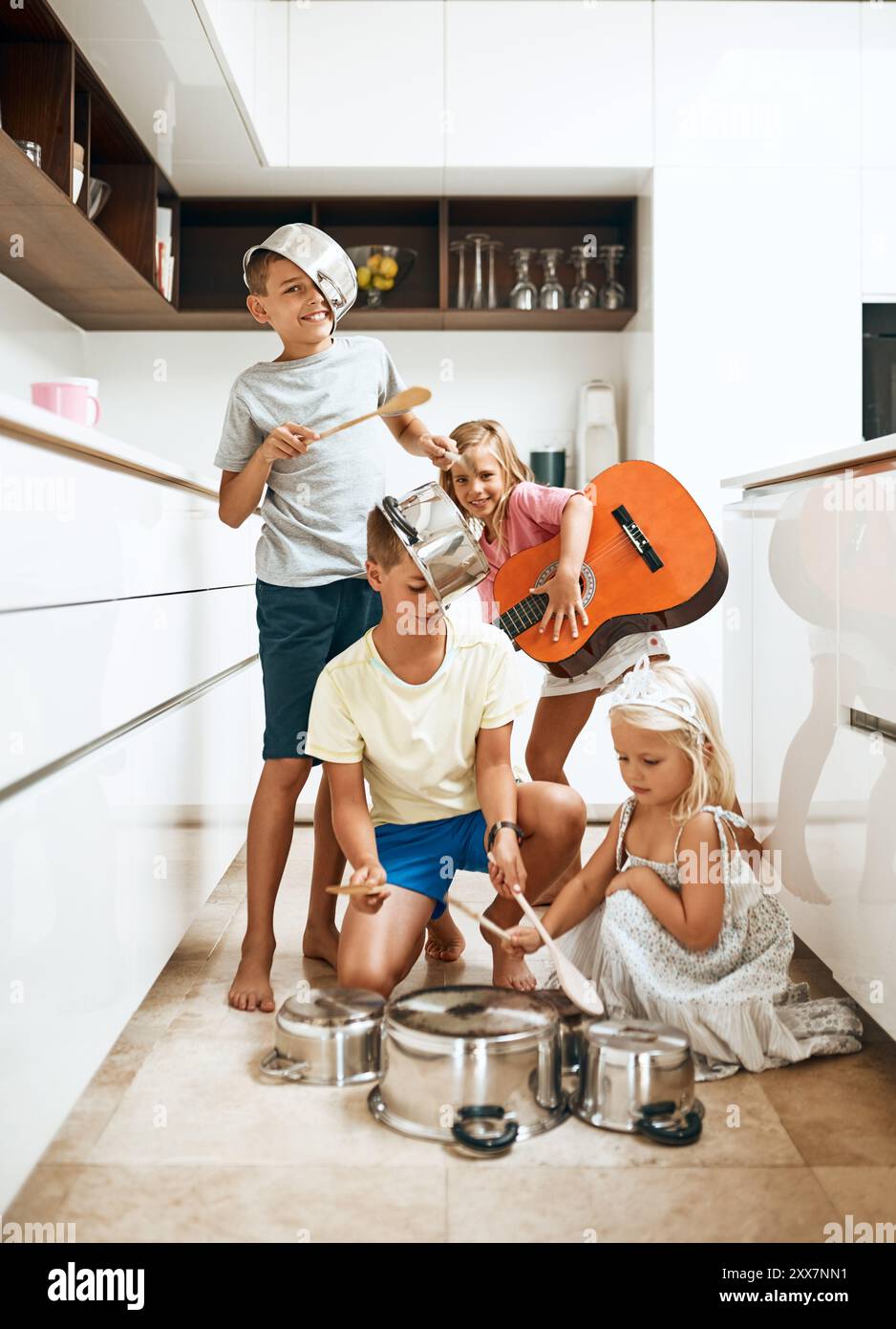 Kids, pots and fun with band, home and happiness with noise, sound and ...