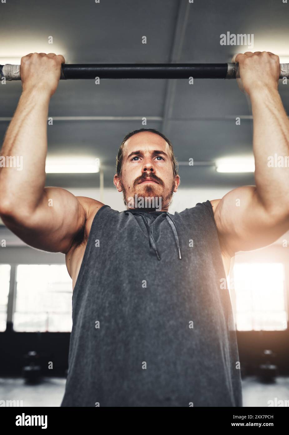 Athlete, strong man and pull ups for exercise, training and wellness ...