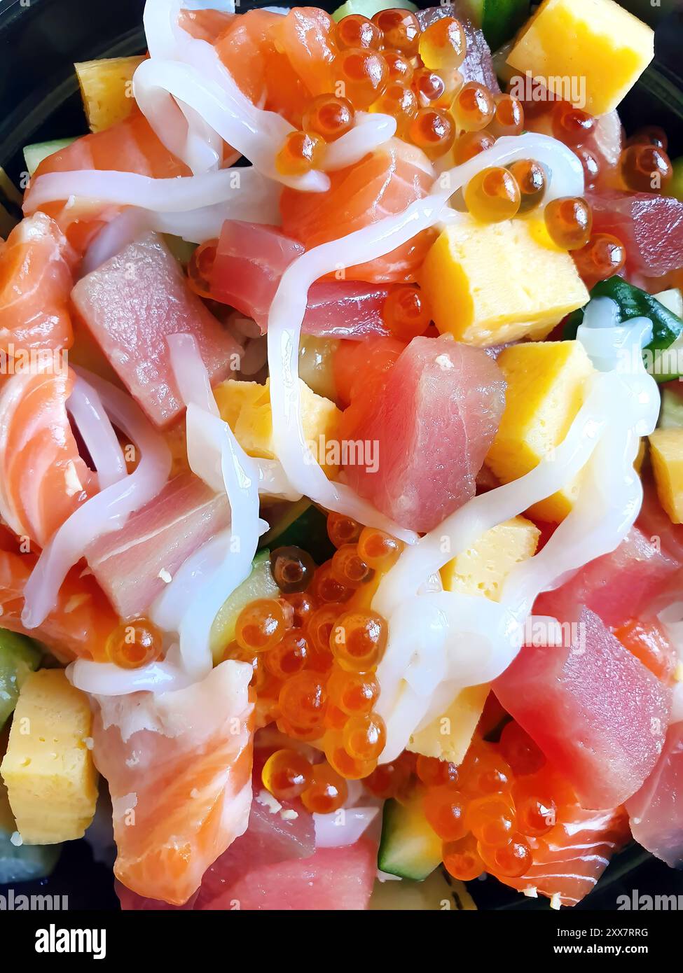 Chirashi Sushi don, mixed seafood covered rice, topping with raw fish ...