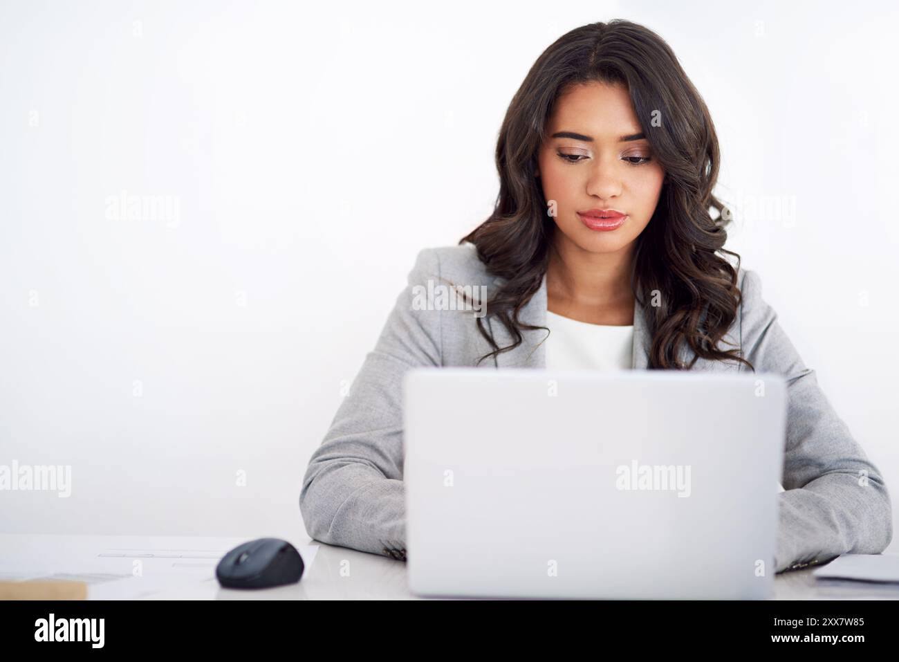 Typing, business and woman with laptop, professional and finance clerk ...