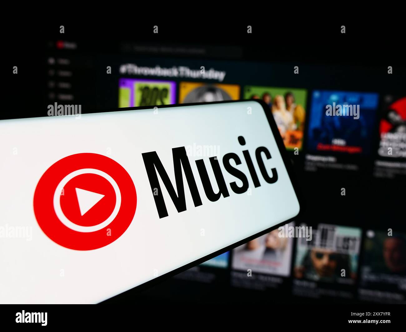 Mobile phone with logo of American music streaming service YouTube ...