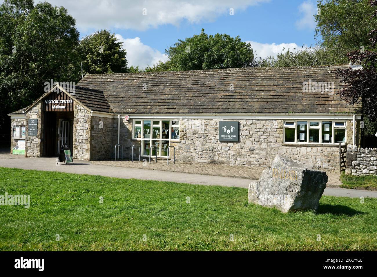 Malham visitors centre with Village name on stone outside Stock Photo ...