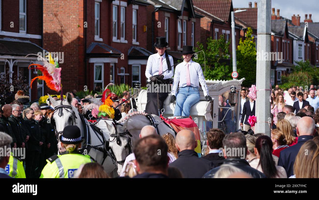 The horse-drawn carriage carrying the coffin of Southport stabbing ...