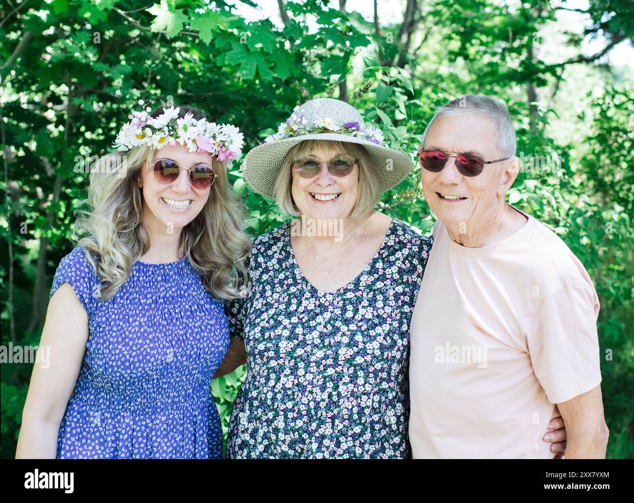 family smiling at the camera at midsummer celebrations Stock Photo - Alamy