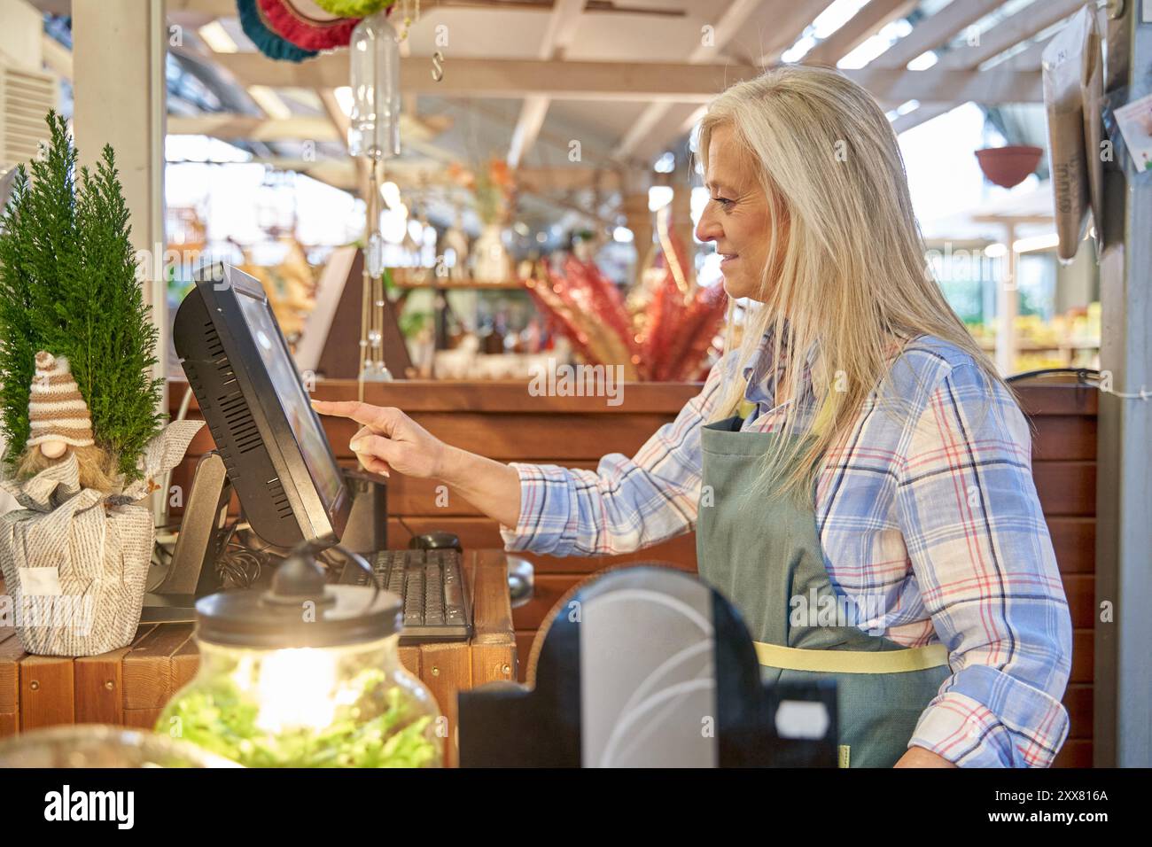 Cashier touchscreen touch screen cash register hi-res stock photography ...