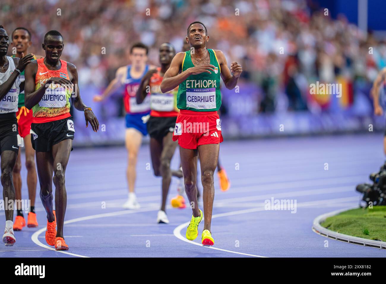 Hagos Gebrhiwet participating in the 5000 meters at the Paris 2024 ...