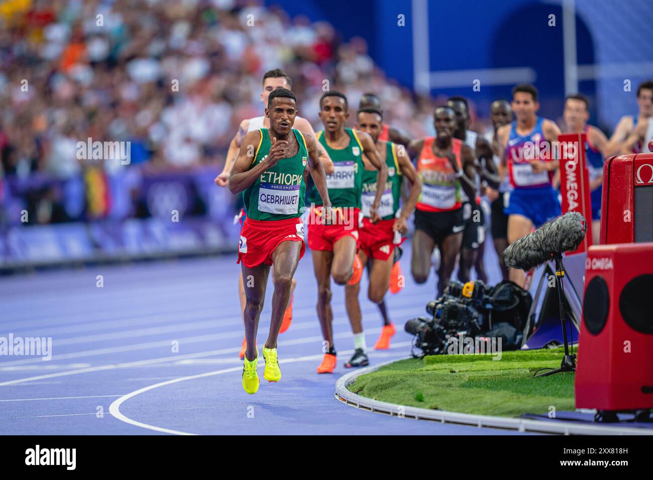 Hagos Gebrhiwet participating in the 5000 meters at the Paris 2024 ...
