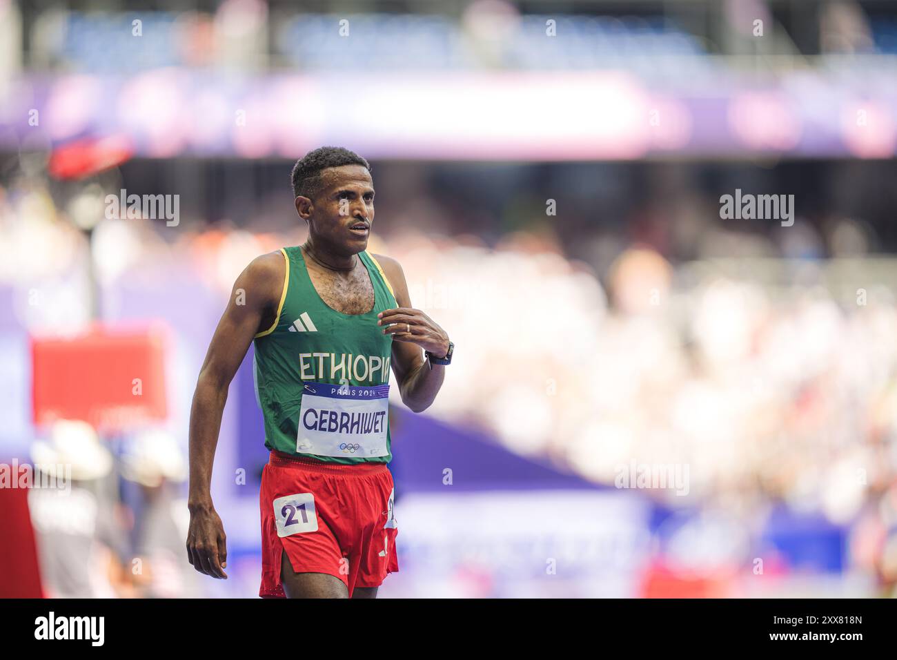 Hagos Gebrhiwet participating in the 5000 meters at the Paris 2024 ...
