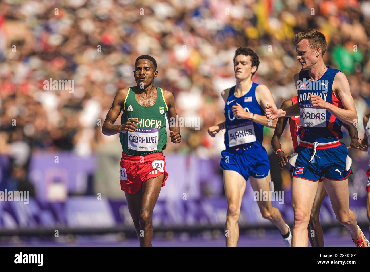 Hagos Gebrhiwet participating in the 5000 meters at the Paris 2024 ...