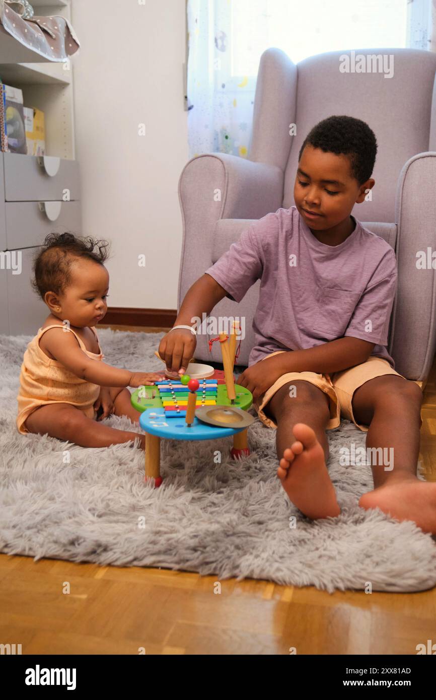 African american toddler playing colorful hi-res stock photography and ...