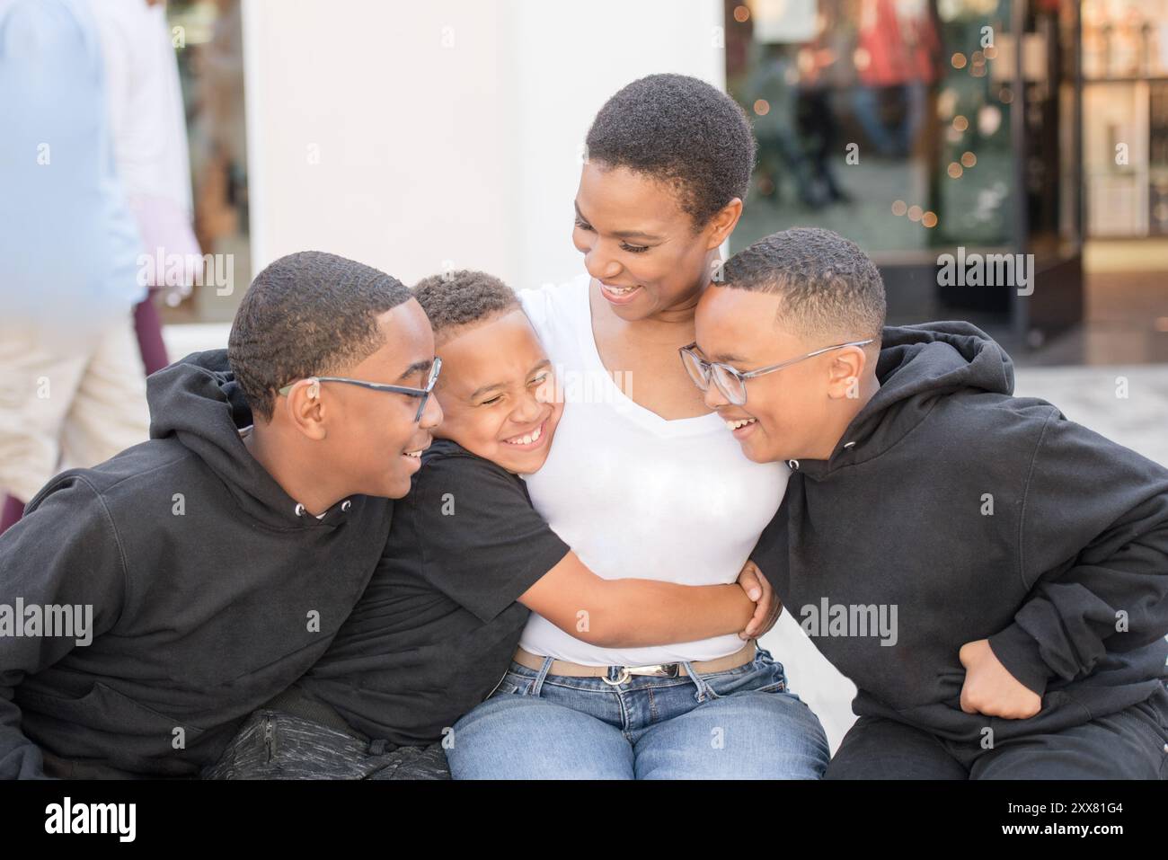 Hugging tight hi-res stock photography and images - Alamy