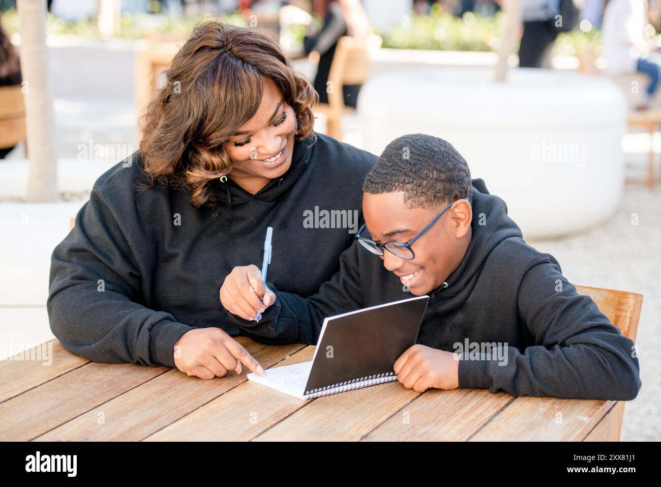 Parent child homework african american hi-res stock photography and ...
