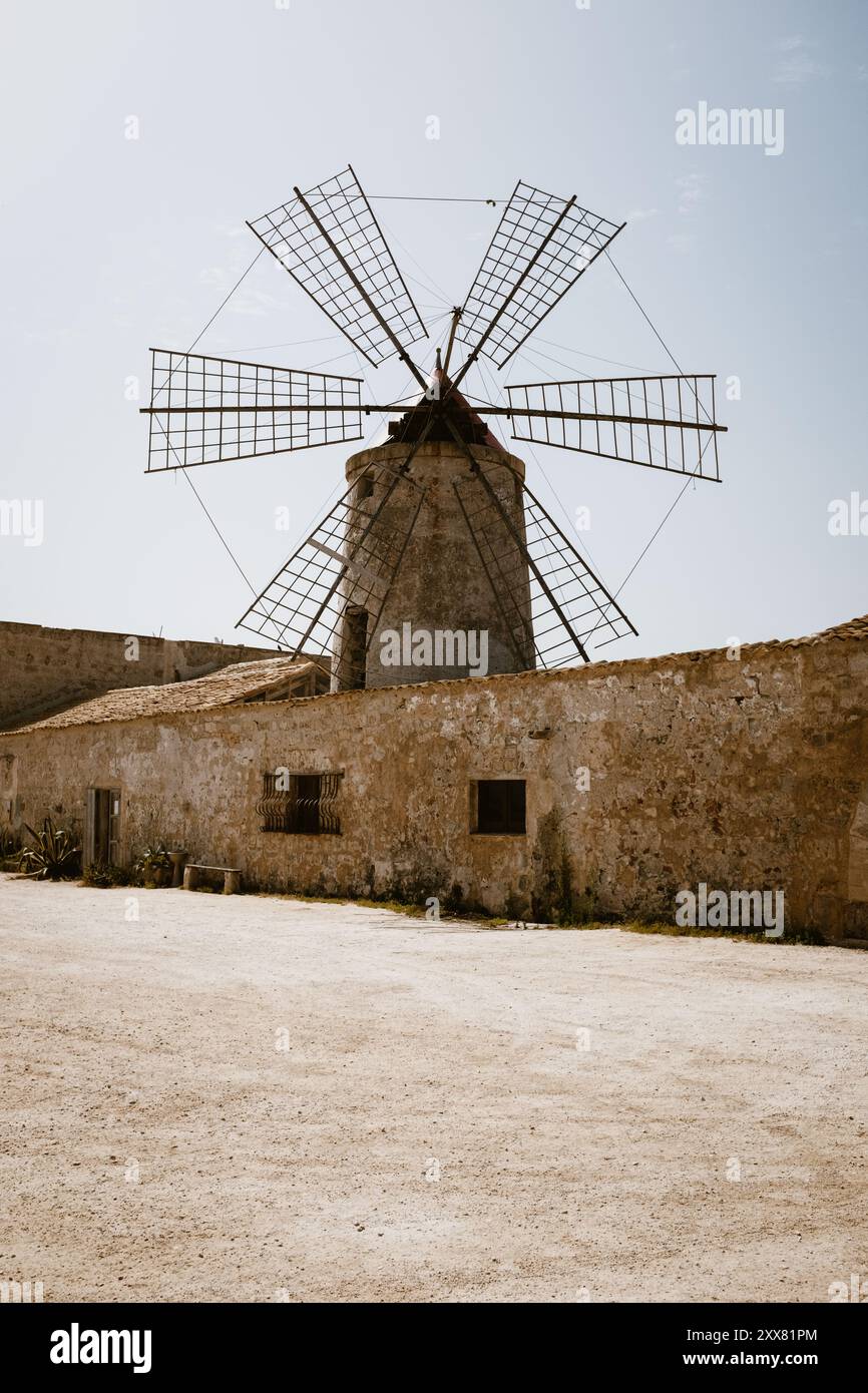 Windmill surrounded by ancient building Stock Photo - Alamy