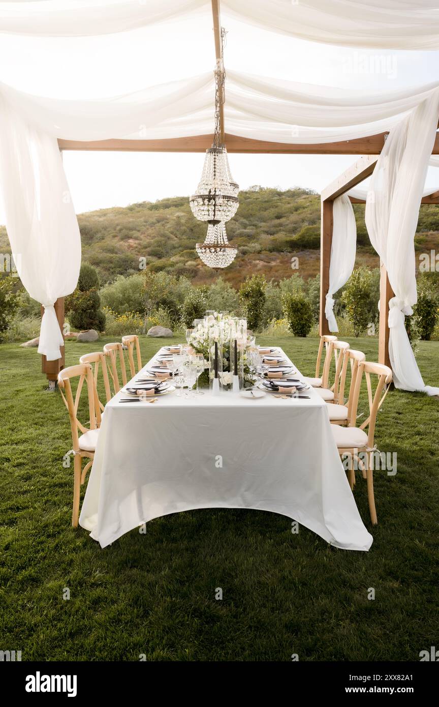 Outdoor wedding reception space green and romantic vertical image Stock ...