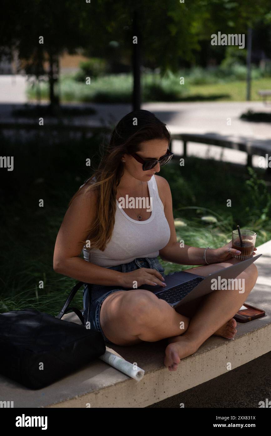 Asian female laptop outside hi-res stock photography and images - Alamy