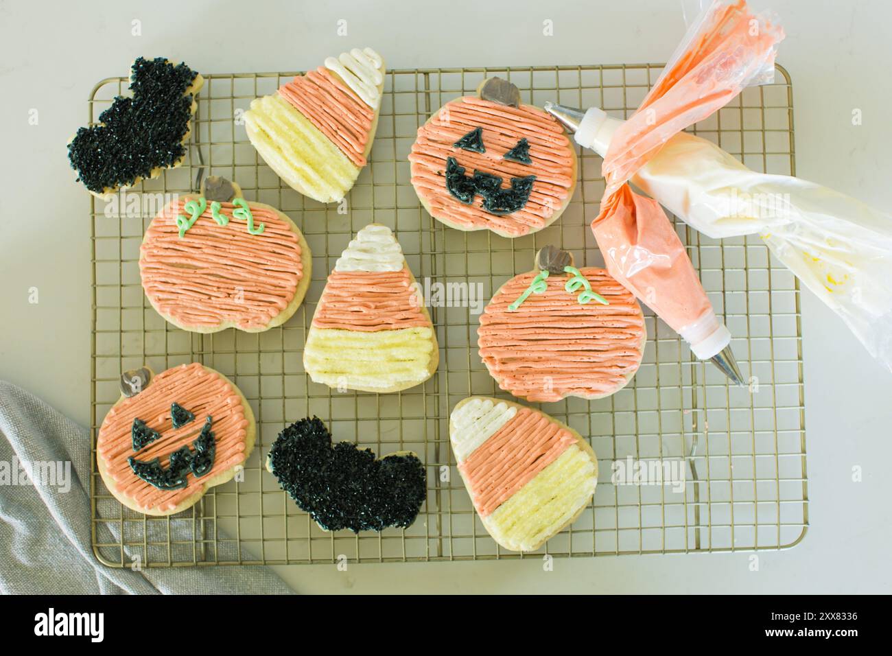 Decorated Halloween cookies in pumpkin, candy corn, and bat shap Stock Photo - Alamy