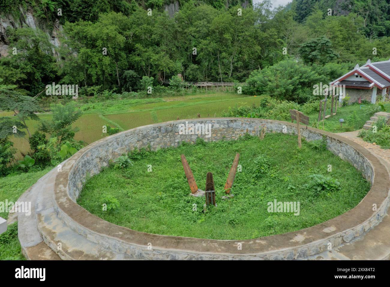 Bomb crater at the Ban Manda war museum, Nong Khiaw, Laos Stock Photo ...