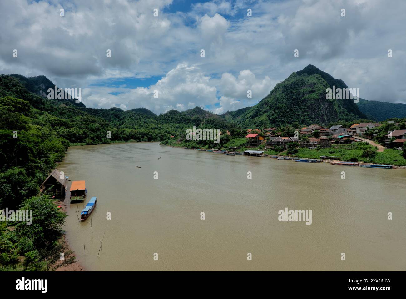 Sleepy life along the Nam Ou River, Nong Khiaw, Laos Stock Photo - Alamy