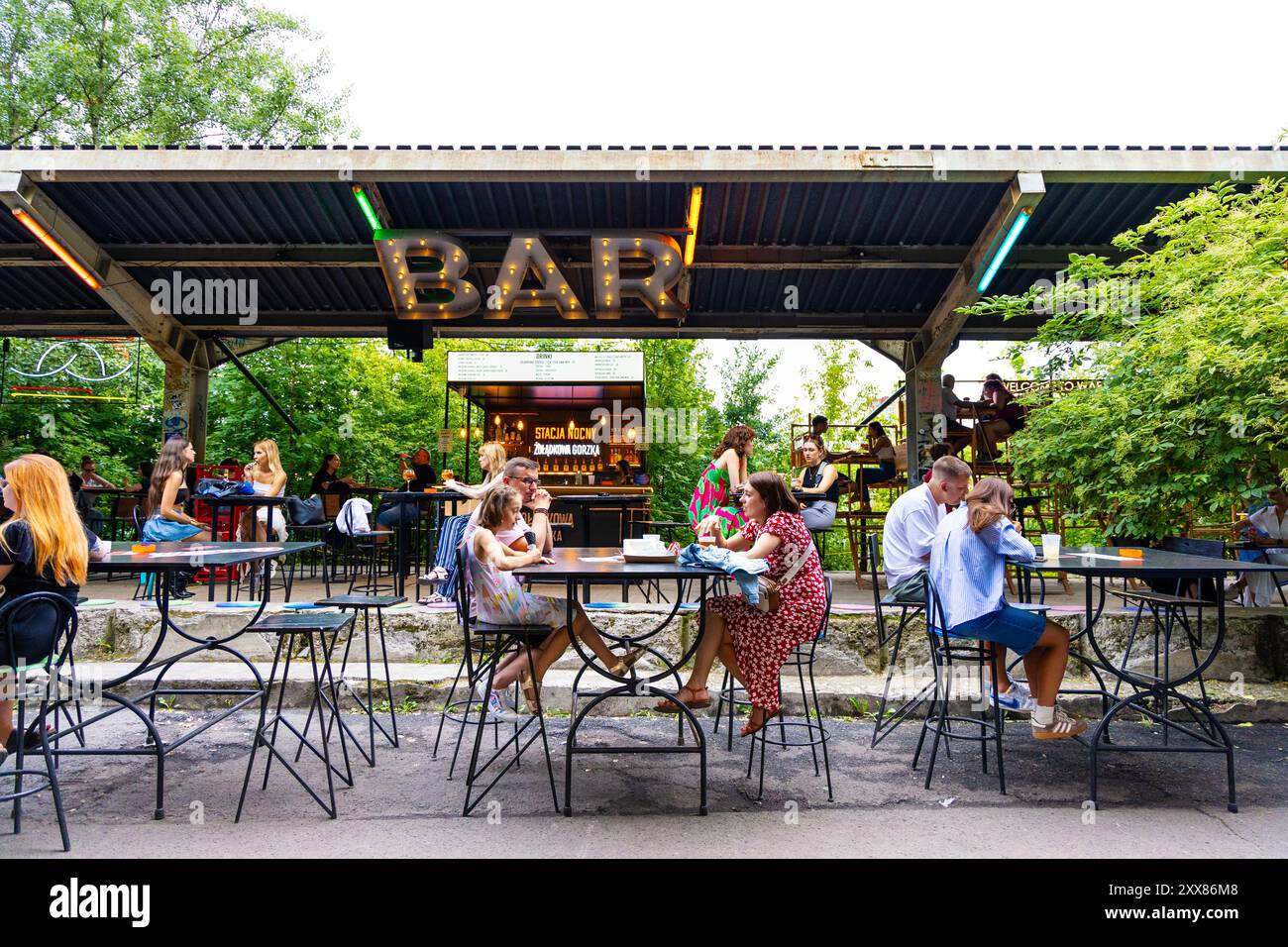 People dining at open-air Nocny Market (Night Market) food market ...