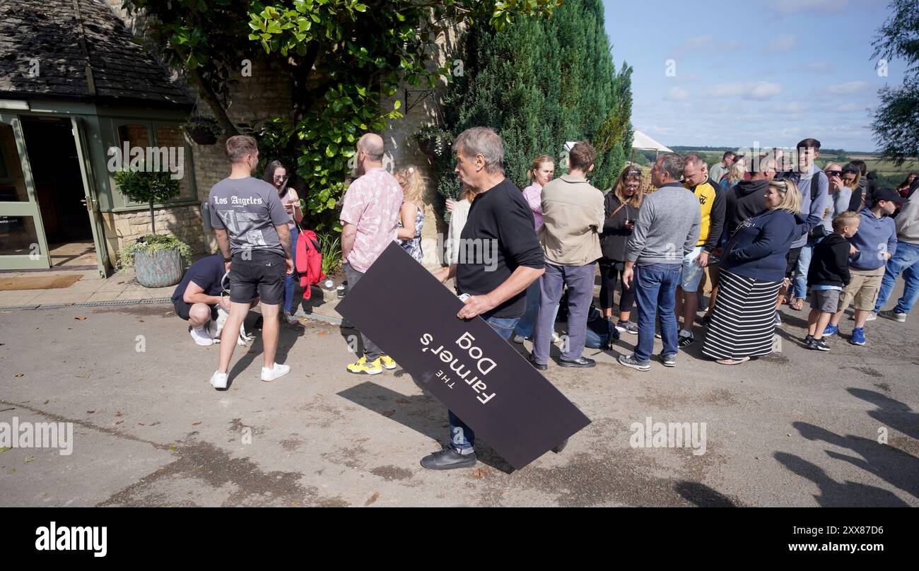 People queuing outside at the opening of Jeremy Clarkson's new pub, The ...