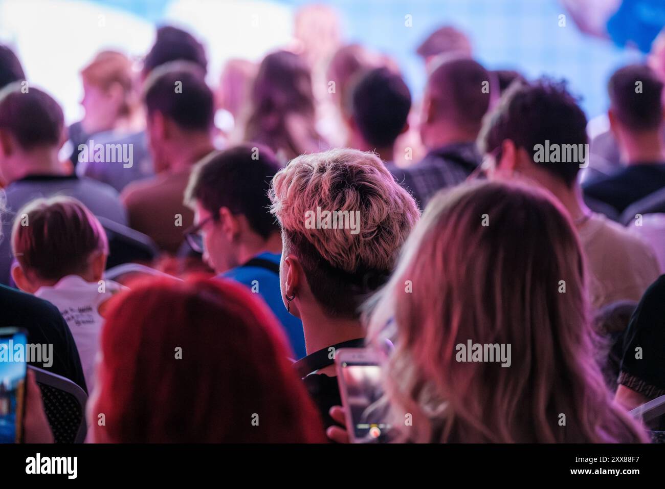 Diverse crowd seated hi-res stock photography and images - Alamy