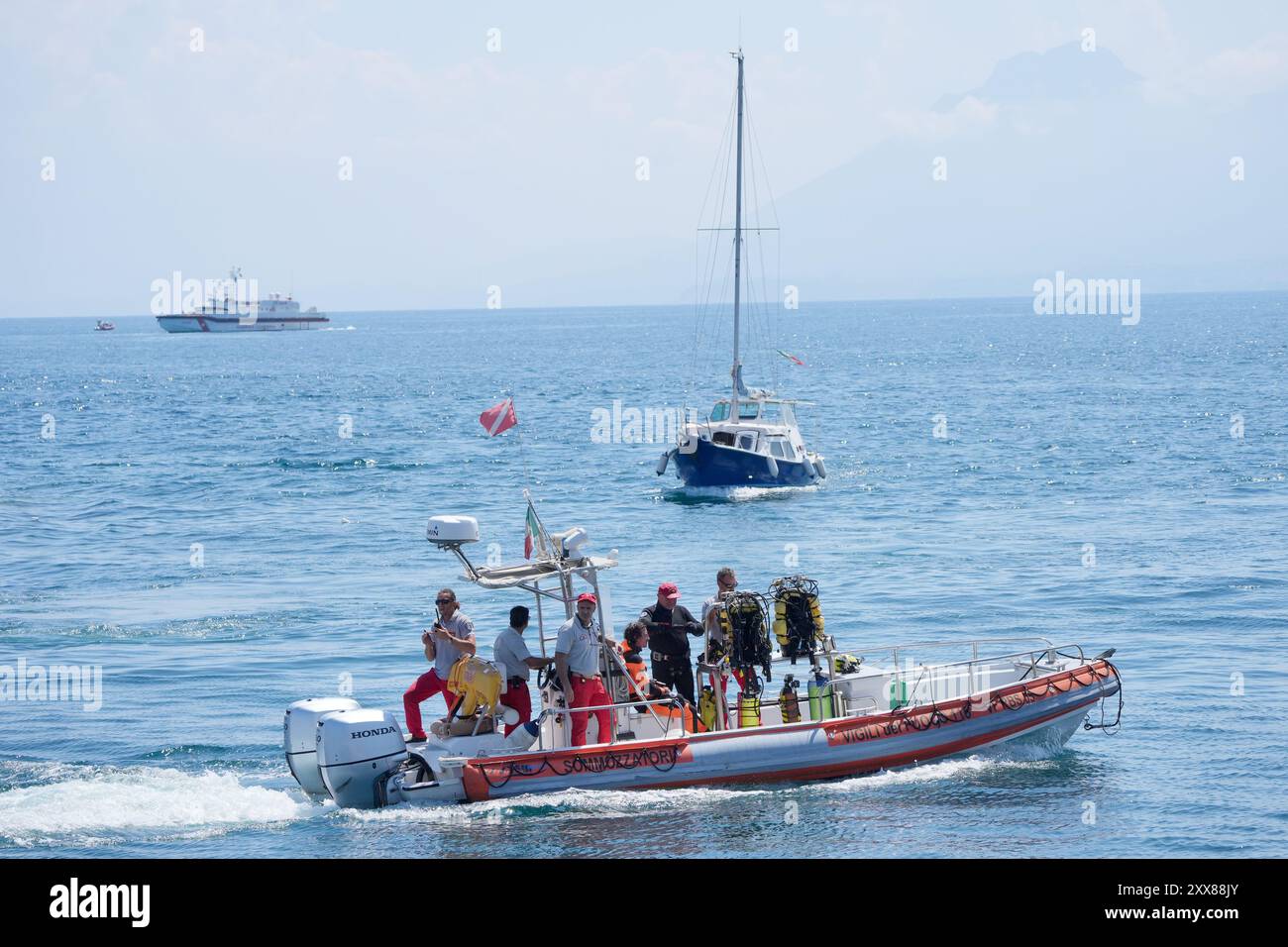 The fire service dive team leaves port heading to the rescue site on ...