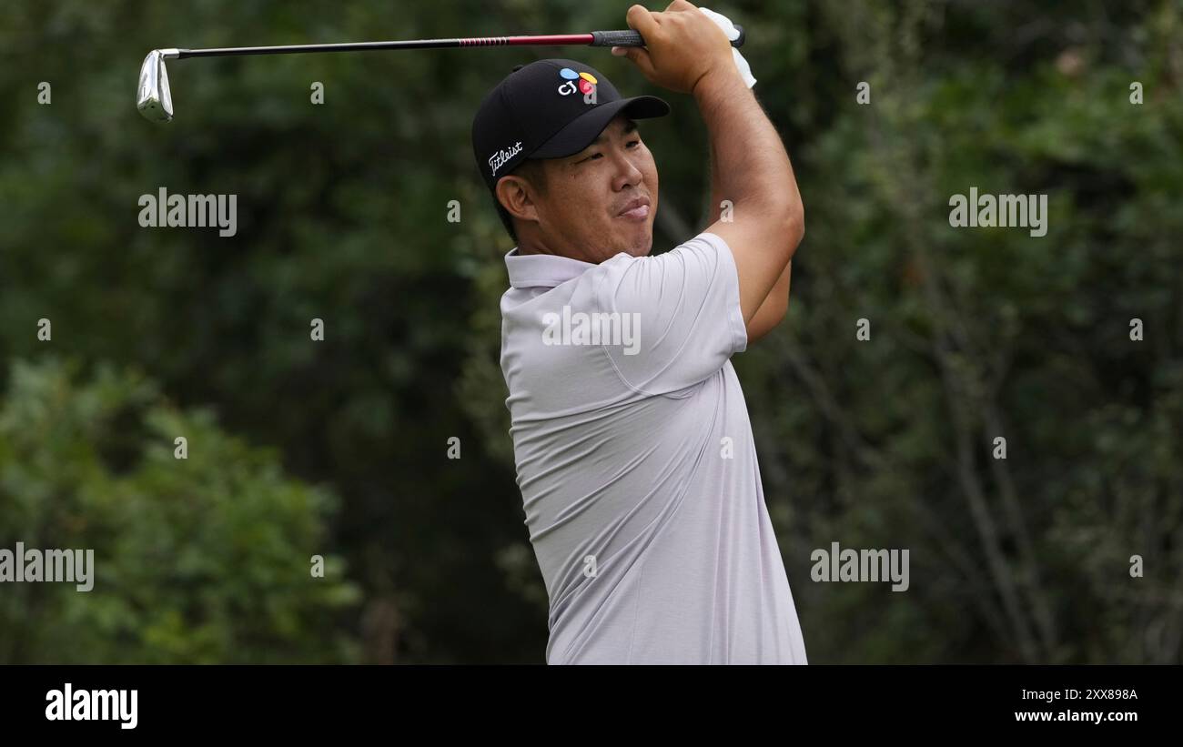 Byeong Hun An, of South Korea, hits from the second tee during the ...