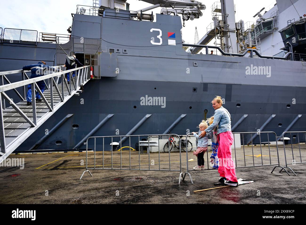 DEN HELDER - Family and friends wait for crew members of Naval Ship Zr.Ms. Karel Doorman in the ...