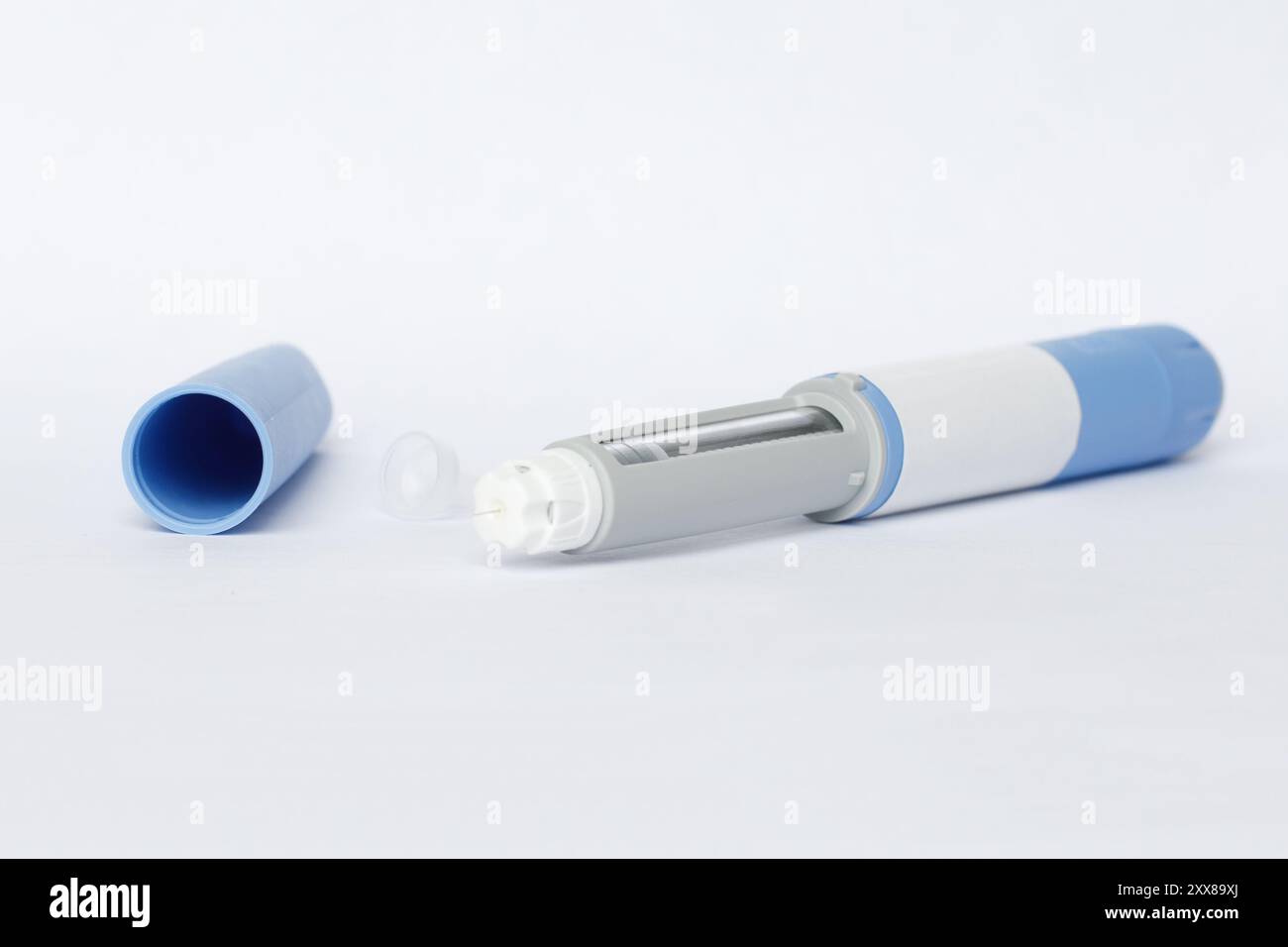 Opened self injection pen macro. Insulin or semaglutide Stock Photo - Alamy
