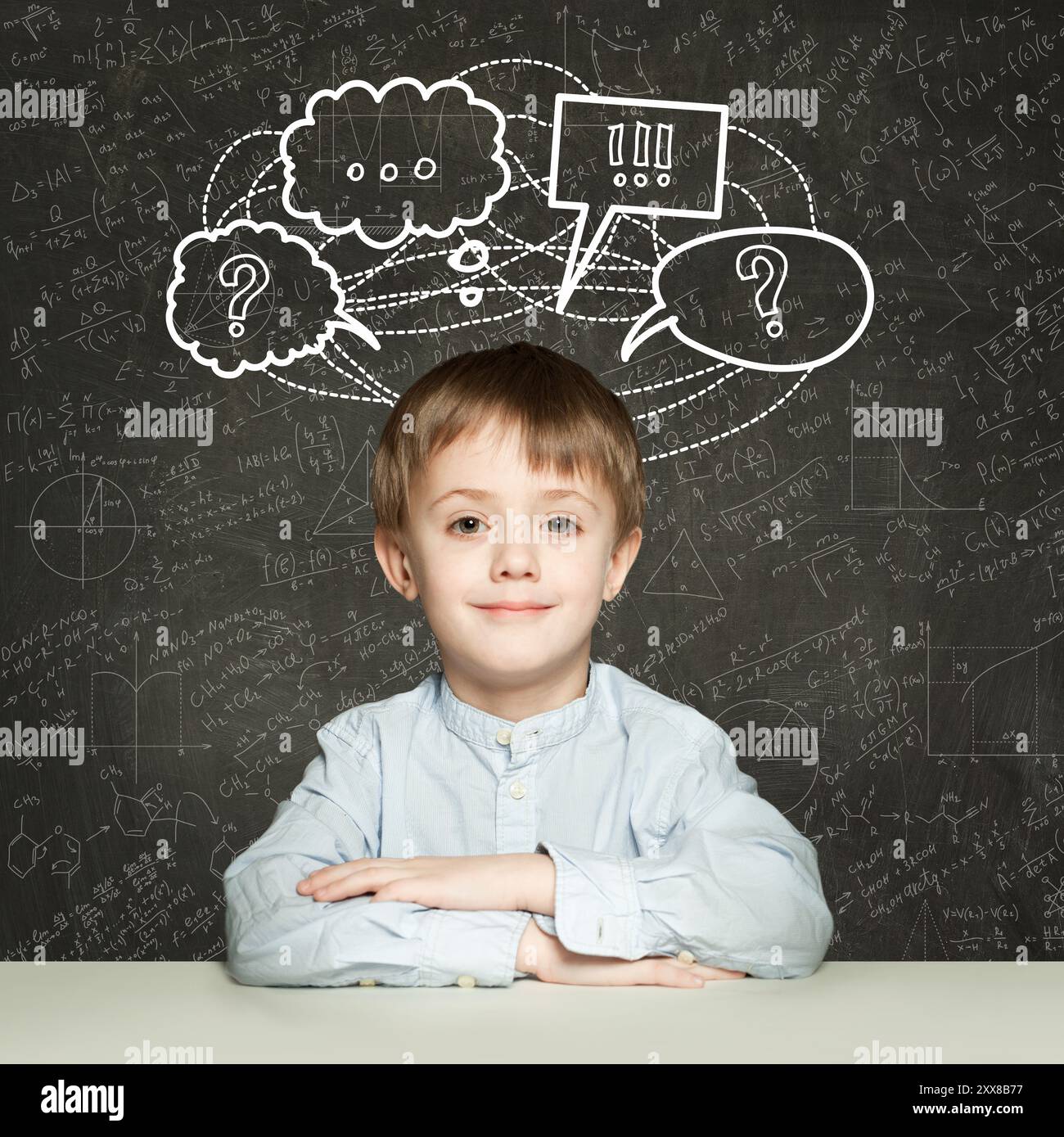 Portrait of cute child boy and thought cloud bubble with question mark ...
