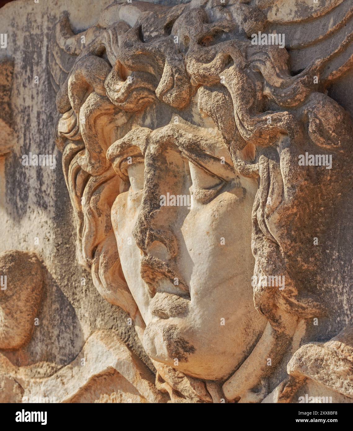 Ancient, face sculpture and architecture as temple in Greece as tourist ...