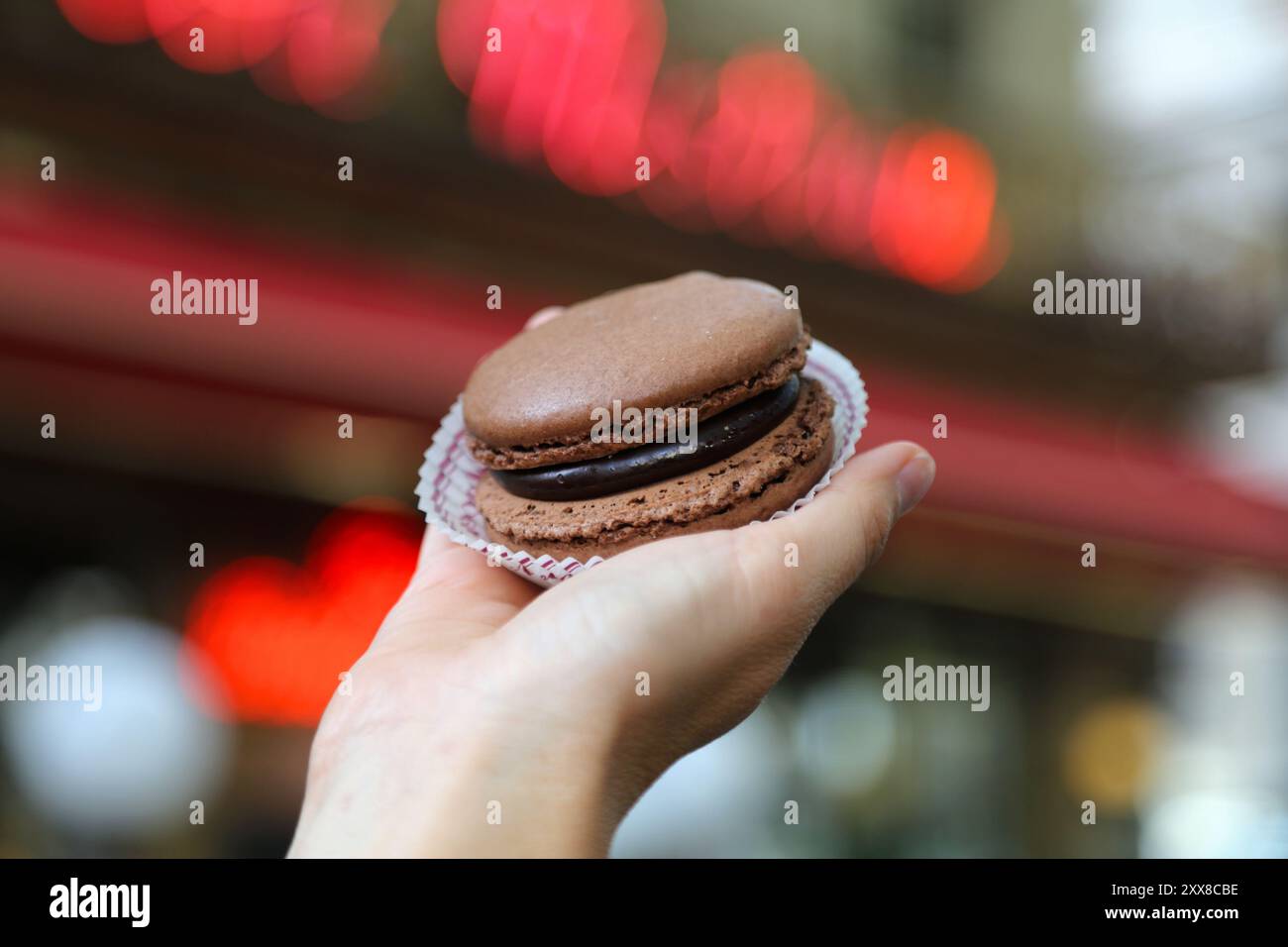 French macaron (also known as macaroon). Confectionery of France. Cocoa ...