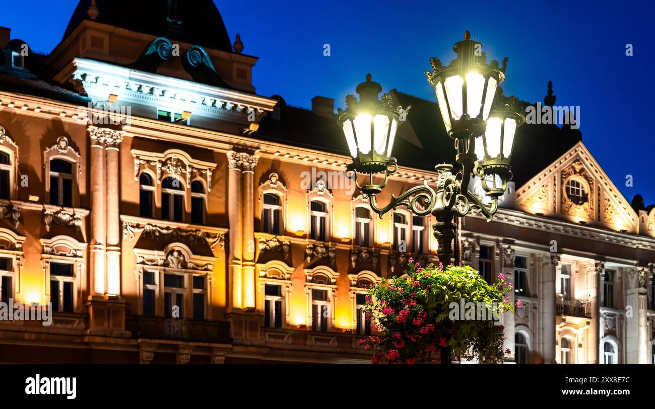 Vintage street iron lamp in the center of Novi sad in Serbia at night ...