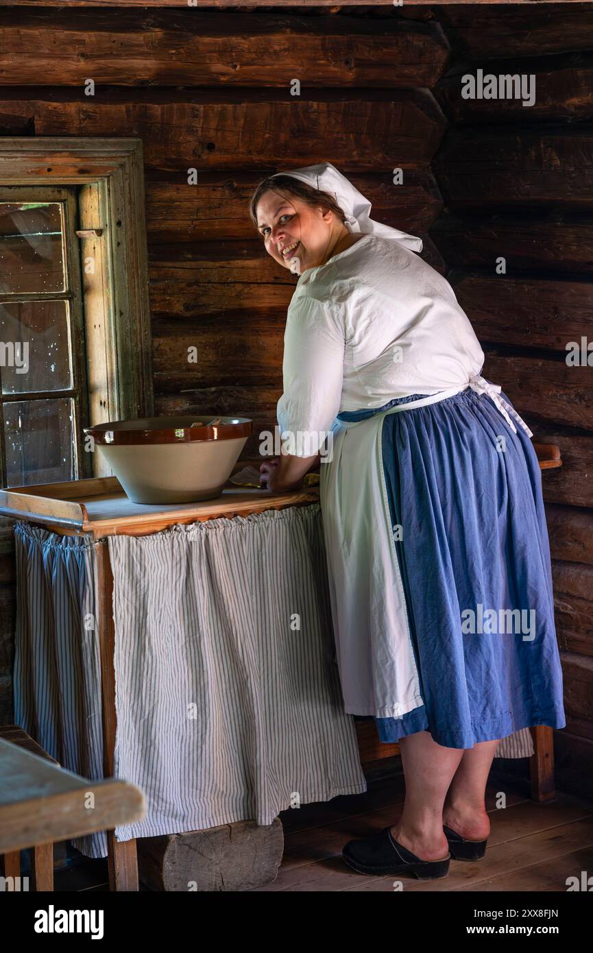 Norway, Oslo, Bygdoy, museum of Norwegian folklore, woman wearing ...