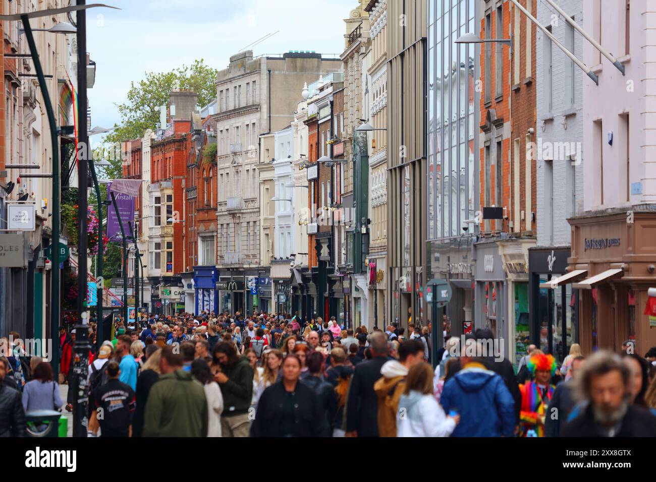 DUBLIN, IRELAND - JULY 5, 2024: People visit famous Grafton Street in ...