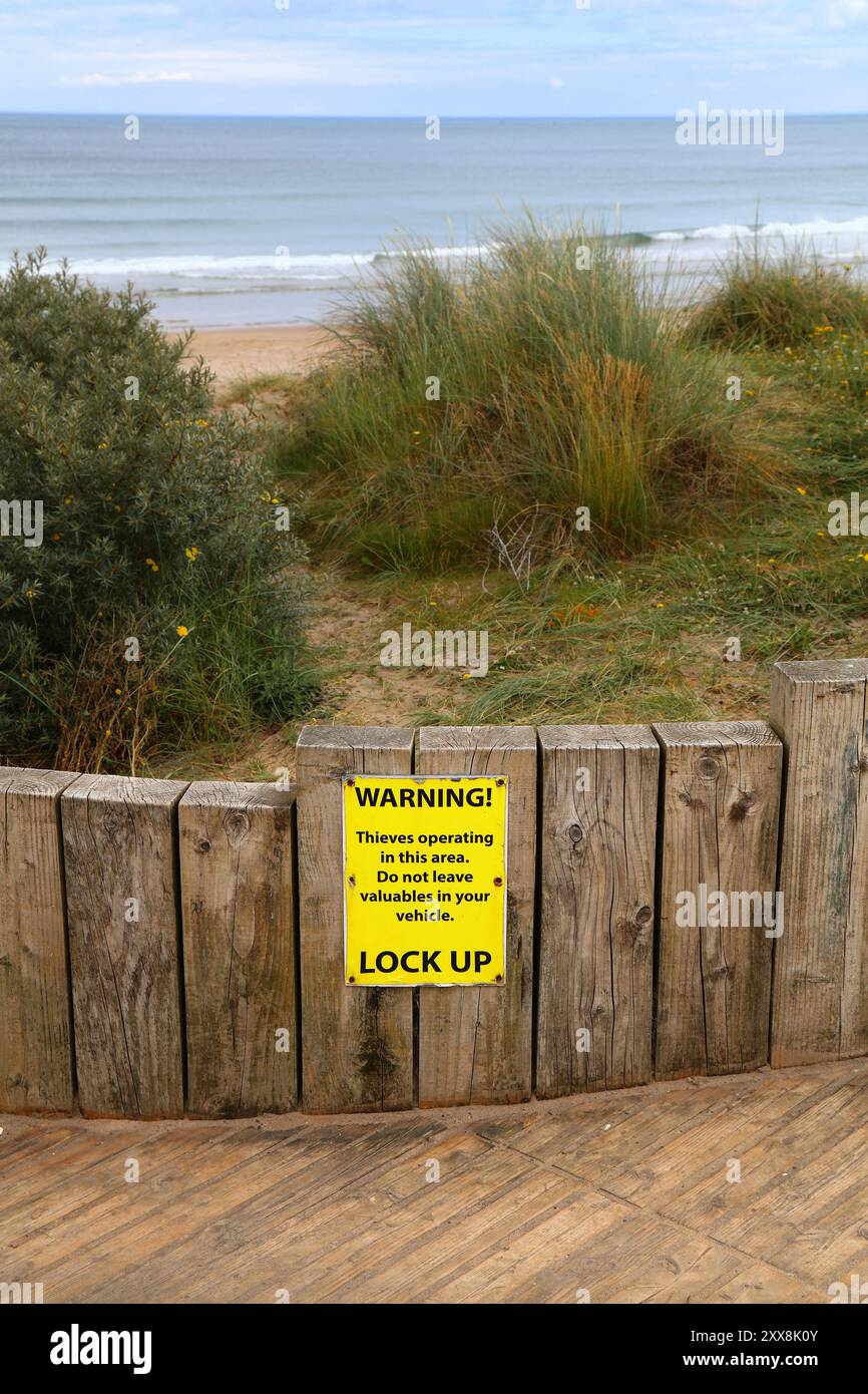 Thief warning sign on Whiterocks Beach in Portrush, County Antrim in ...