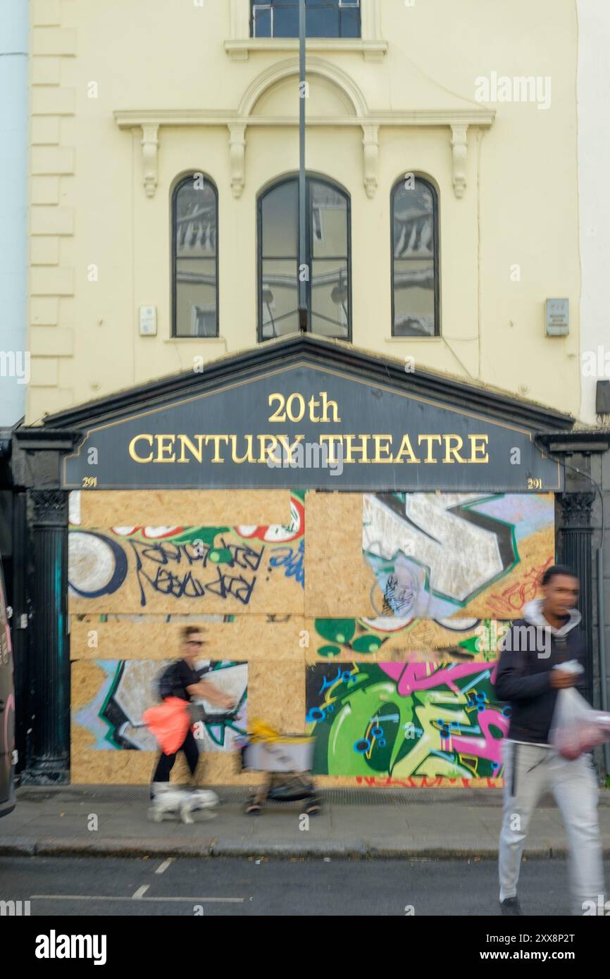 London, UK. Hoarding being put up to protect multimillion pound houses ...