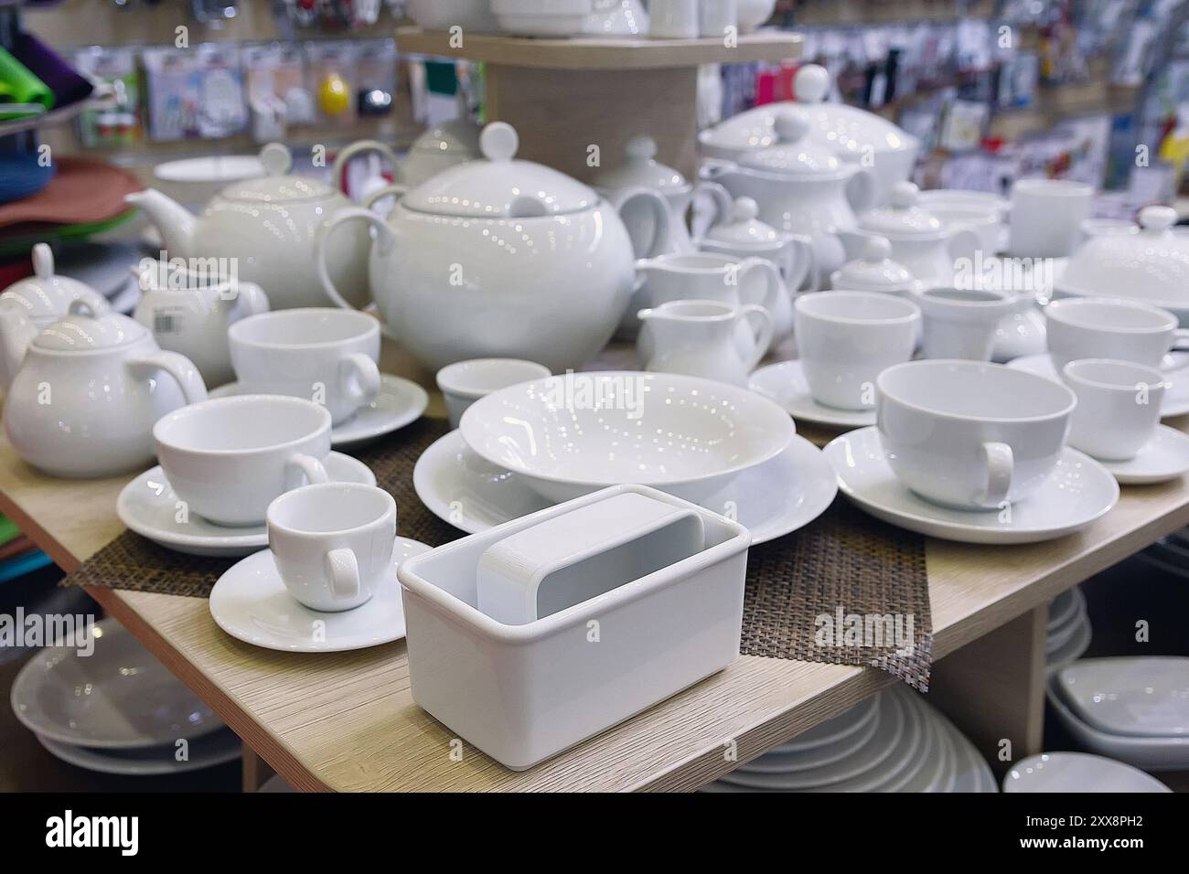 Modern crockery, porcelain, utensils and other different stuff on shop ...
