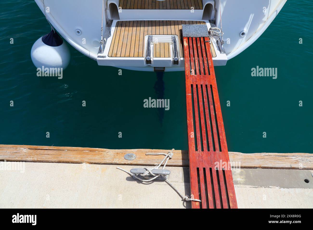 Sailing in Split, Croatia. Sailing yacht wooden boarding gangway ...