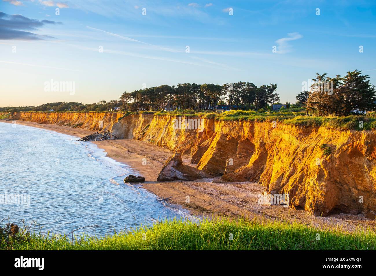 France, Morbihan, Penestin, ochre cliffs bordering the Mine d’Or beach ...