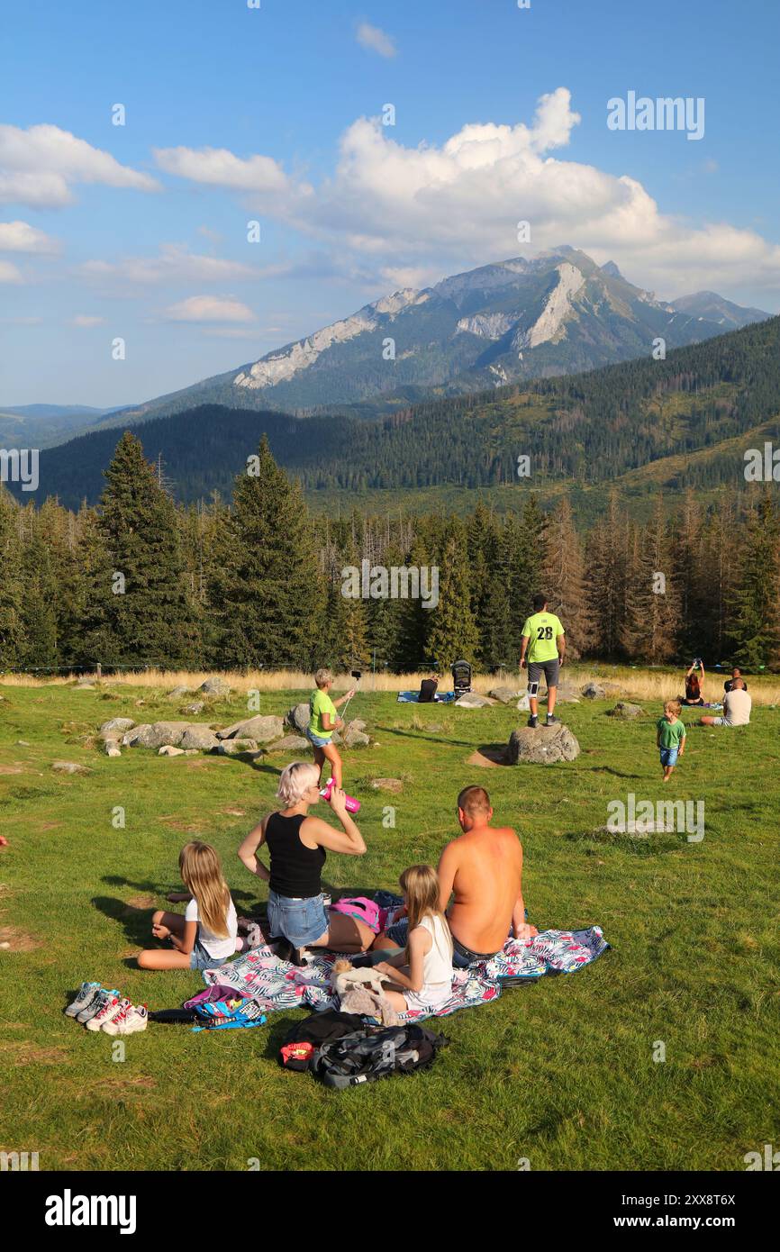 TATRA MOUNTAINS, POLAND - SEPTEMBER 10, 2023: Tourists visit Rusinowa ...