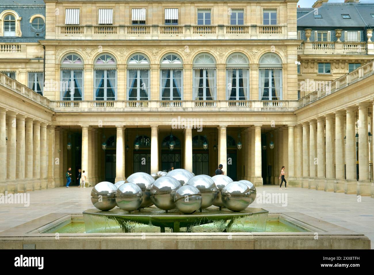 France, Paris, Palais Royal, fountain with metal spheres by sculptor ...
