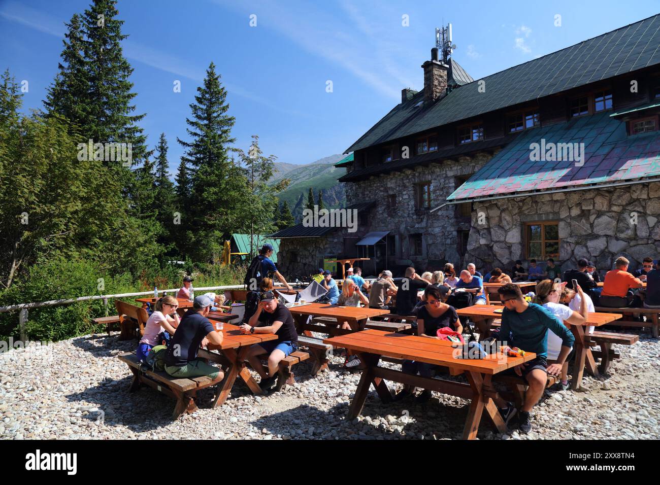 TATRA MOUNTAINS, POLAND - SEPTEMBER 9, 2023: Tourists visit Murowaniec ...
