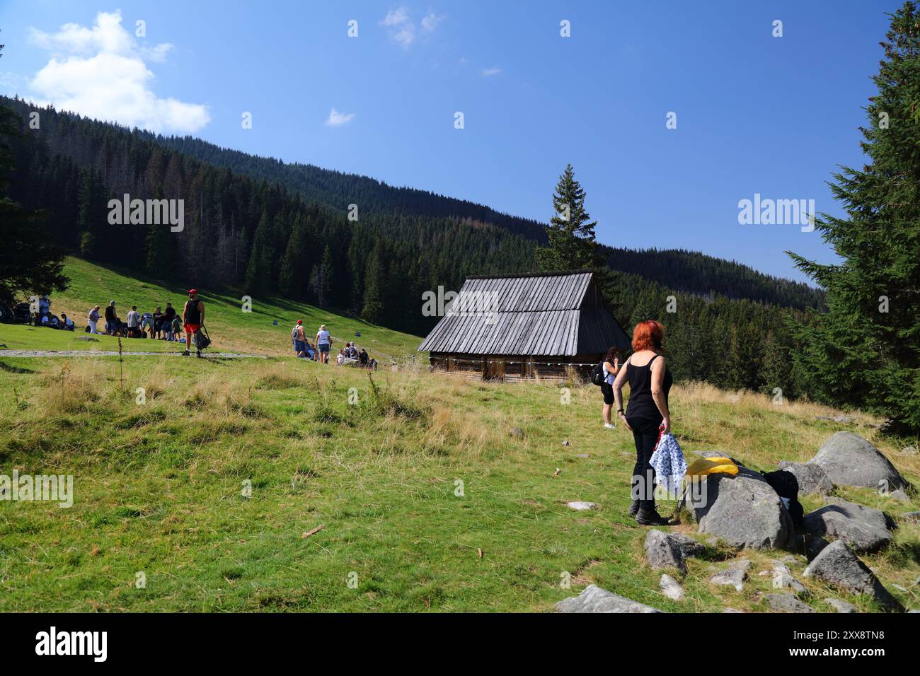 TATRA MOUNTAINS, POLAND - SEPTEMBER 10, 2023: Tourists visit Rusinowa ...