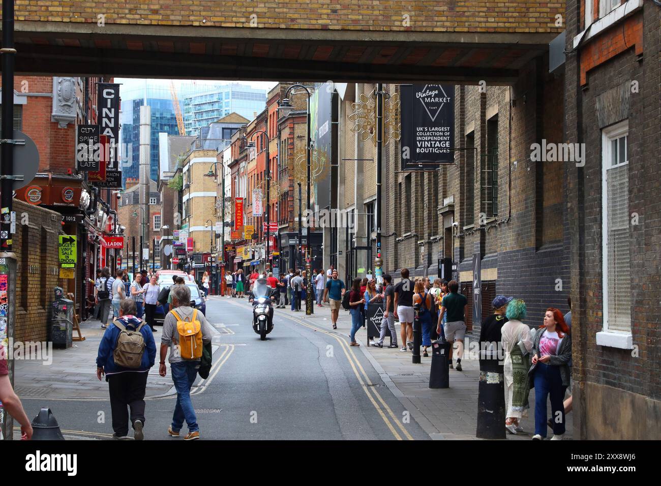 LONDON, UK - JULY 13, 2019: People visit Brick Lane street in ...