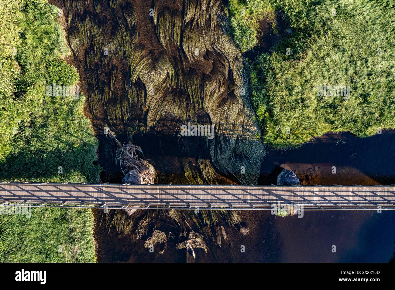 United Kingdom, Lake district, Penrith, A bridge crosses a river ...