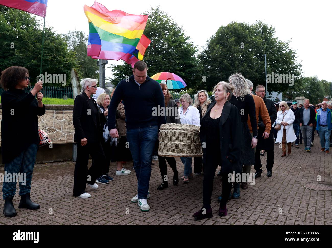 The coffin carrying Nell McCafferty is carried into St. Columba's ...