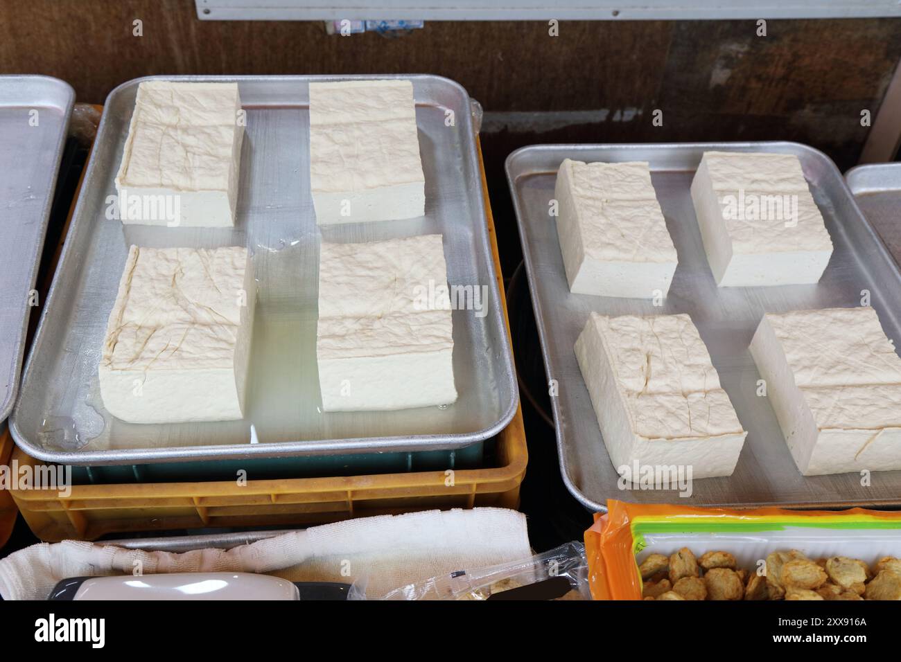 Korean food at Nambu Market in Jeonju, South Korea. Fresh tofu blocks ...